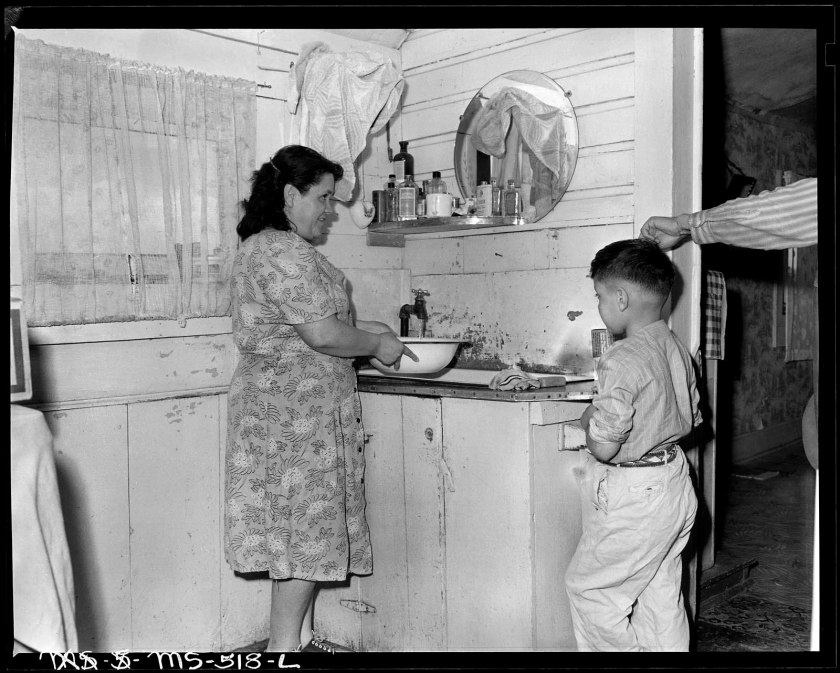 Mrs. Manuel Alcala and son in corner of their kitchenArt Blart _ art ...